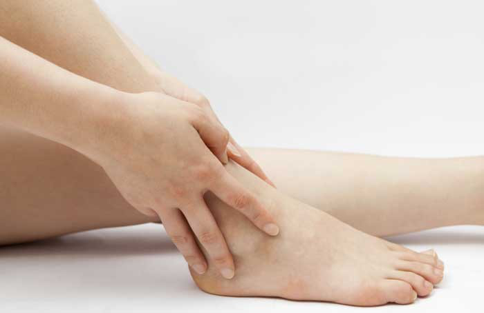 Swollen Feet Even After Giving Birth: Causes & Reliefs | New Health Advisor